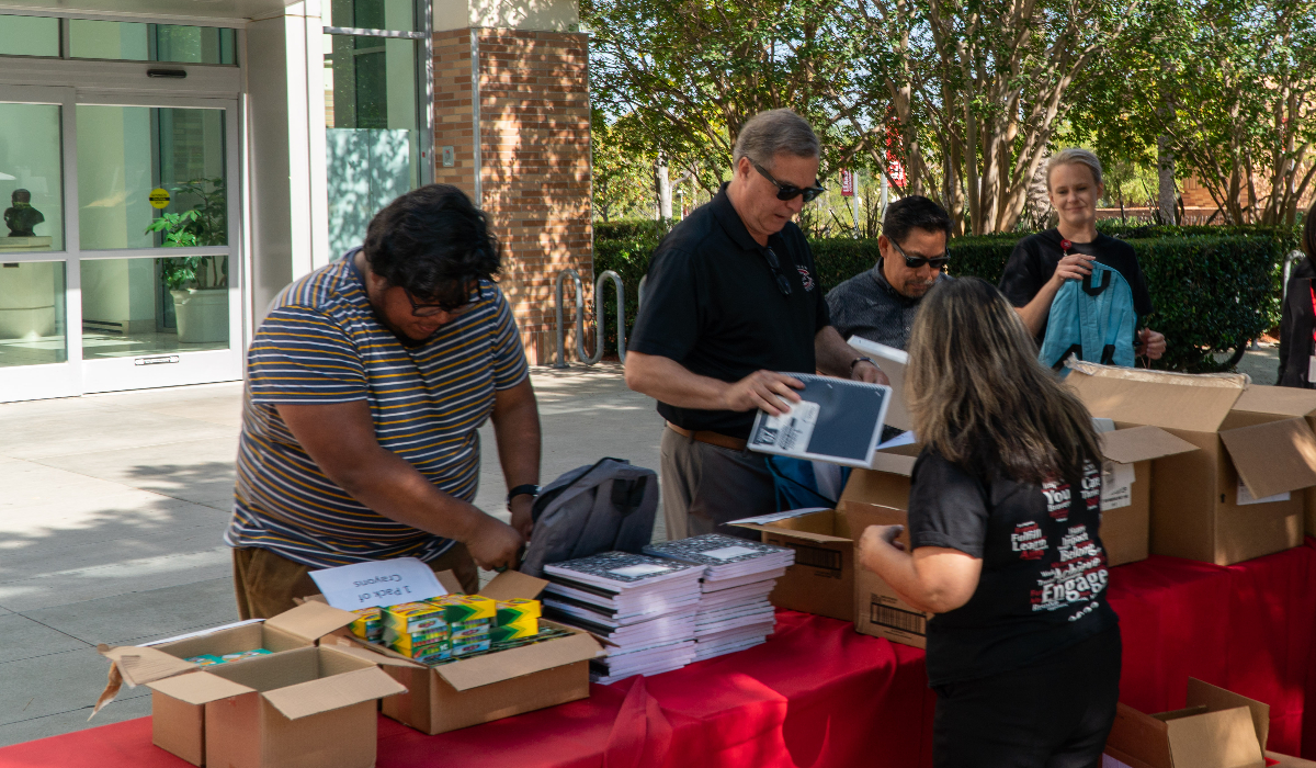 Chapman Staff Stuffs Backpacks for Local Students, Community Resource ...