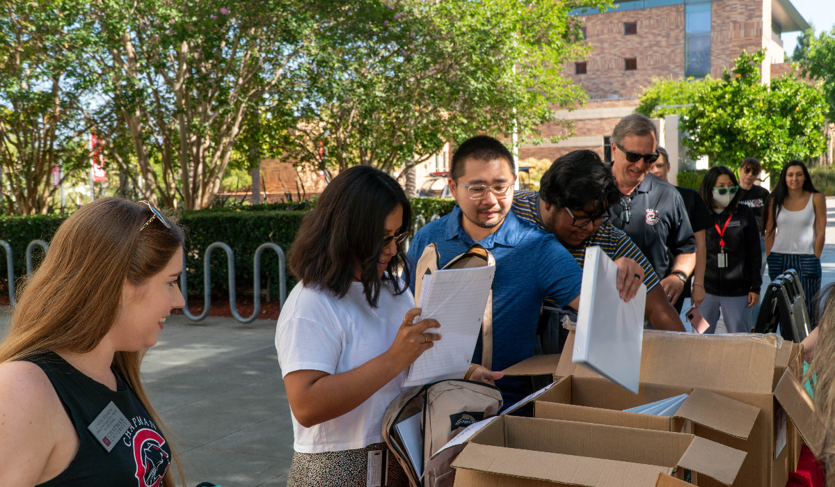 Chapman Staff Stuffs Backpacks for Local Students, Community Resource ...